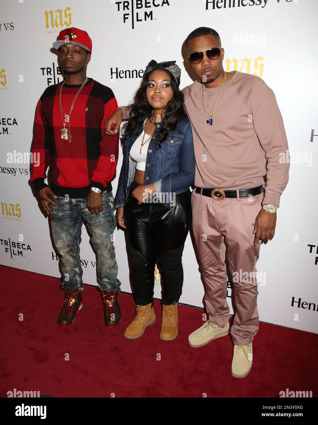 From right, rapper Nas, daughter Destiny Jones and brother Jabari Jones ...