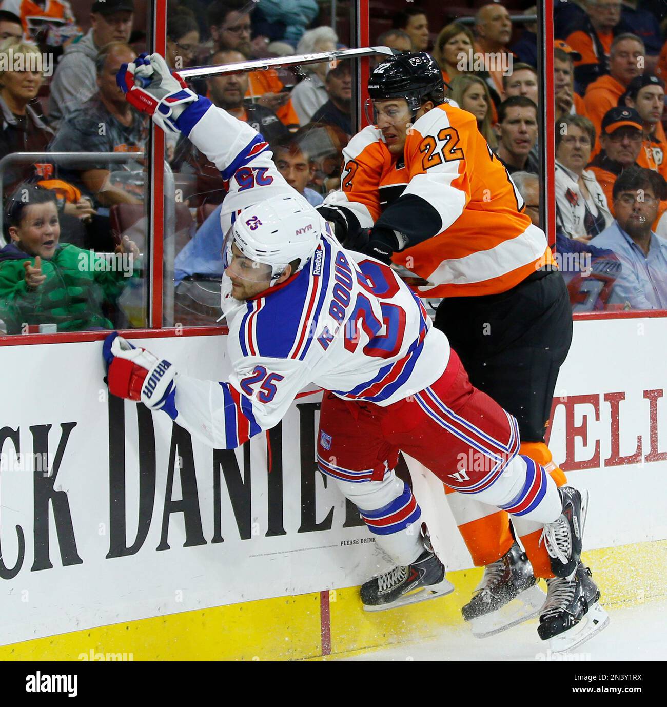 Philadelphia Flyers' Luke Schenn, right, collides with New York Rangers' Ryan Bourque during the ...