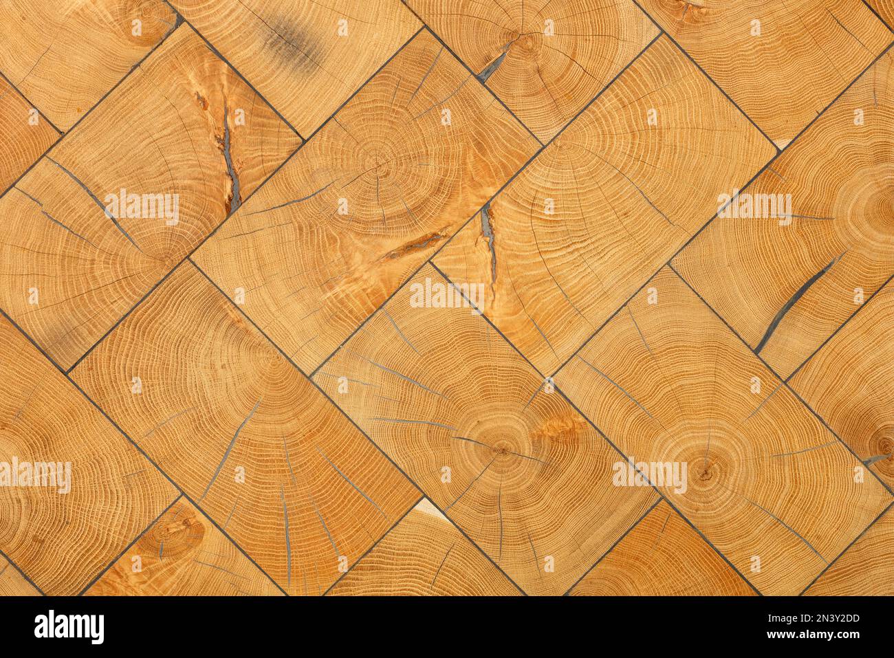 Beautiful wooden background made of natural cross sections in the form ... Beautiful wooden background made of natural cross sections in the form ...