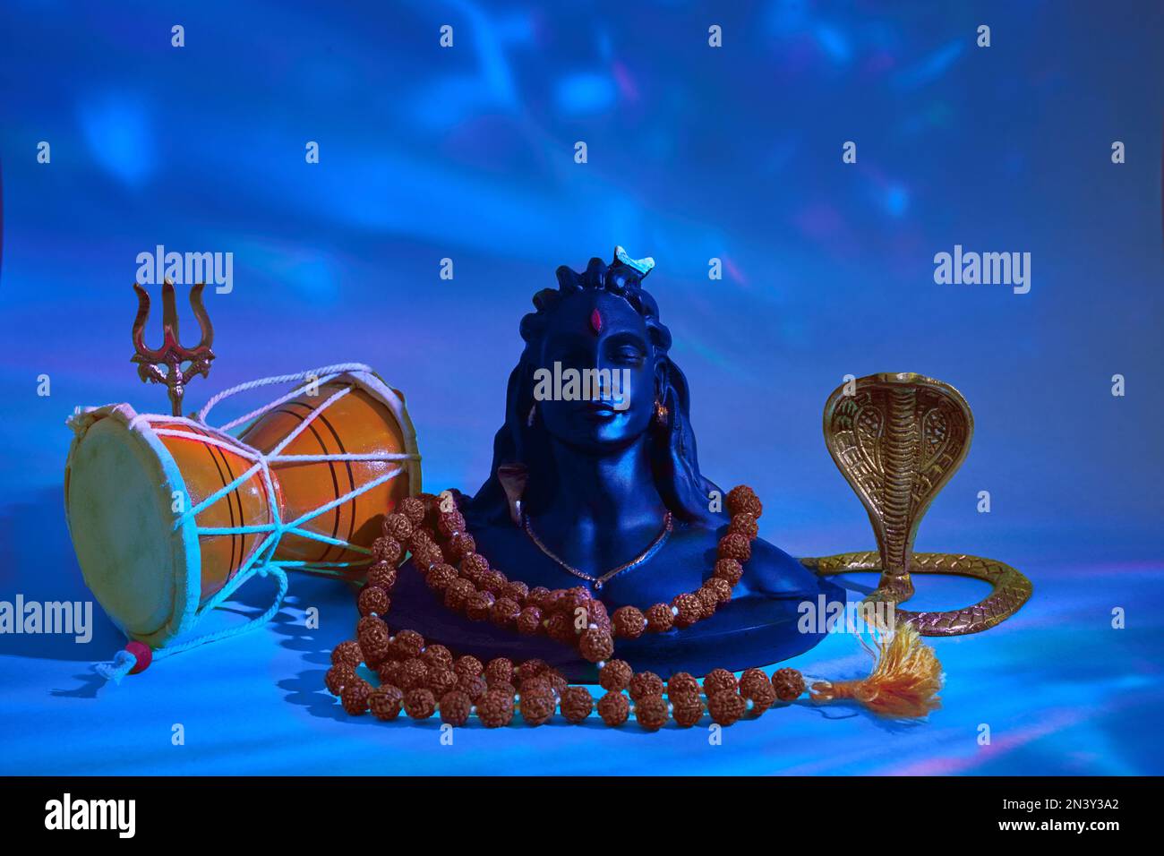 Shivaratri background with Shivas trident, Pellet Drum Damroo musical ...