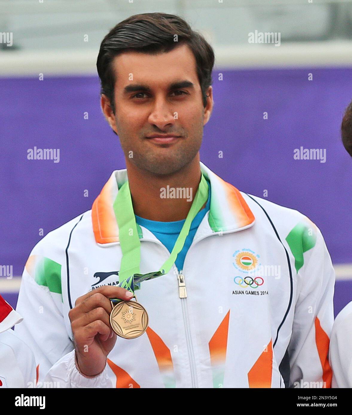 India's Yuki Bhambri poses for a photo after the men's tennis final at ...