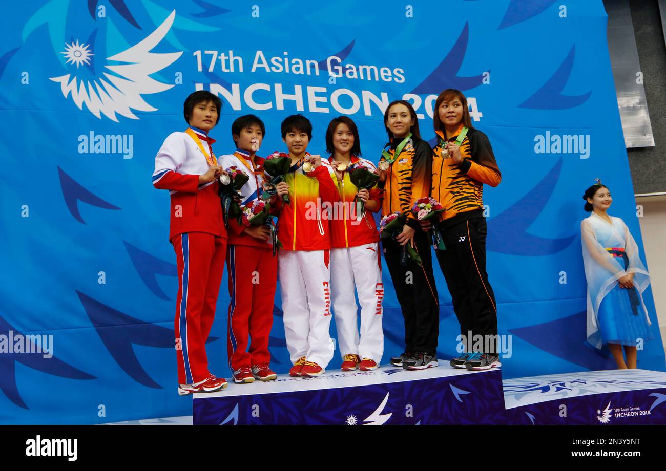 From left, silver medal winners North Korea's Kim Unhyang, Song ...