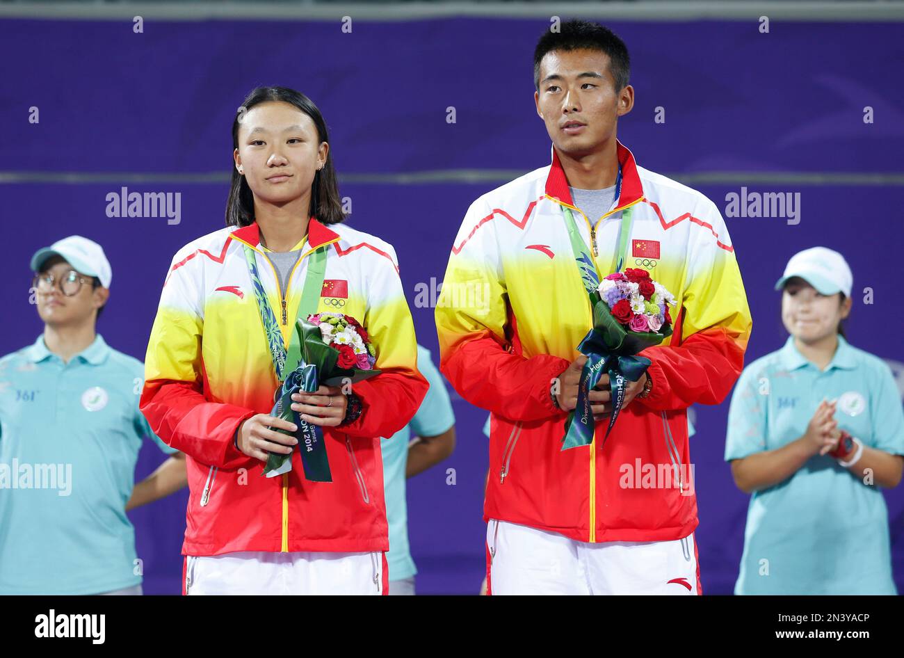 Bronze medal winners China's Zheng Jie, left, and Zhang Ze celebrate ...
