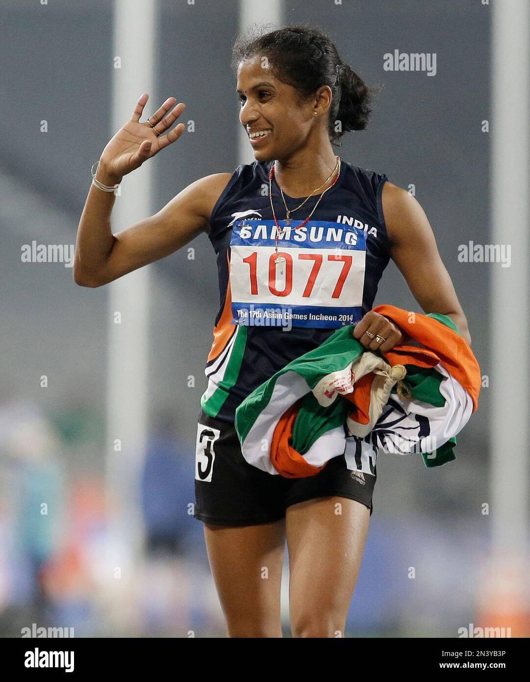 India's Jaisha Orchatteri Puthiya Veetil waves to the crowd after her ...
