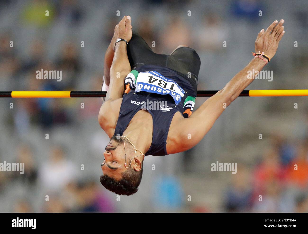 India's Nikhil Chittarasu competes in men's high jump final at the 17th ...