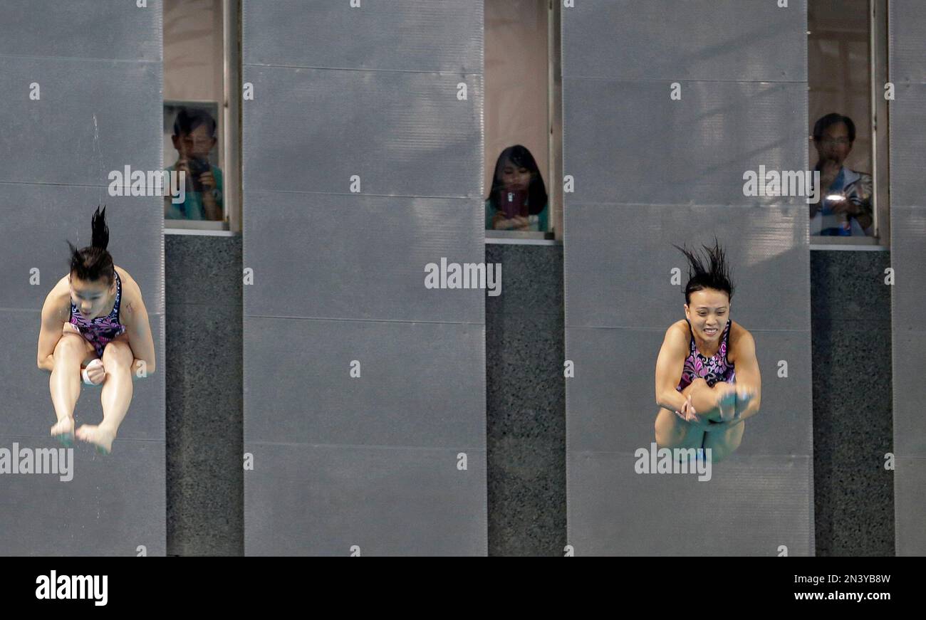 during the Women's Synchronized 3m Springboard diving final at 17th ...