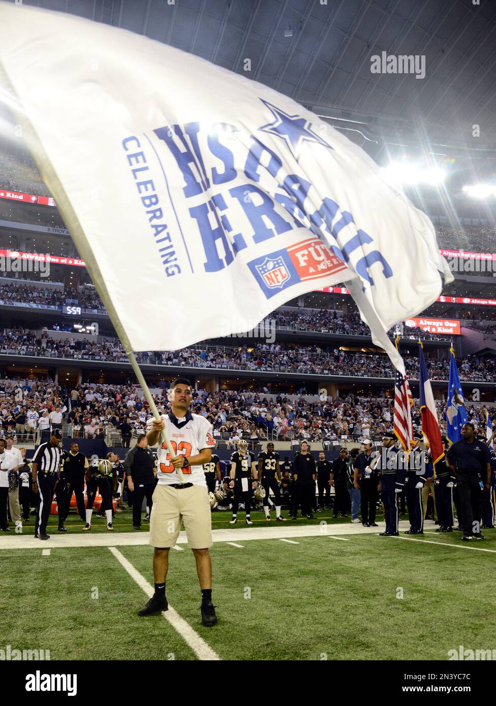 Luis Chaparro of North Dallas High School waves a Hispanic Heritage ...