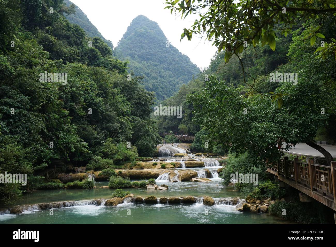 A waterfall in a forest in Guizhou, China perfect for wallpapers and ...