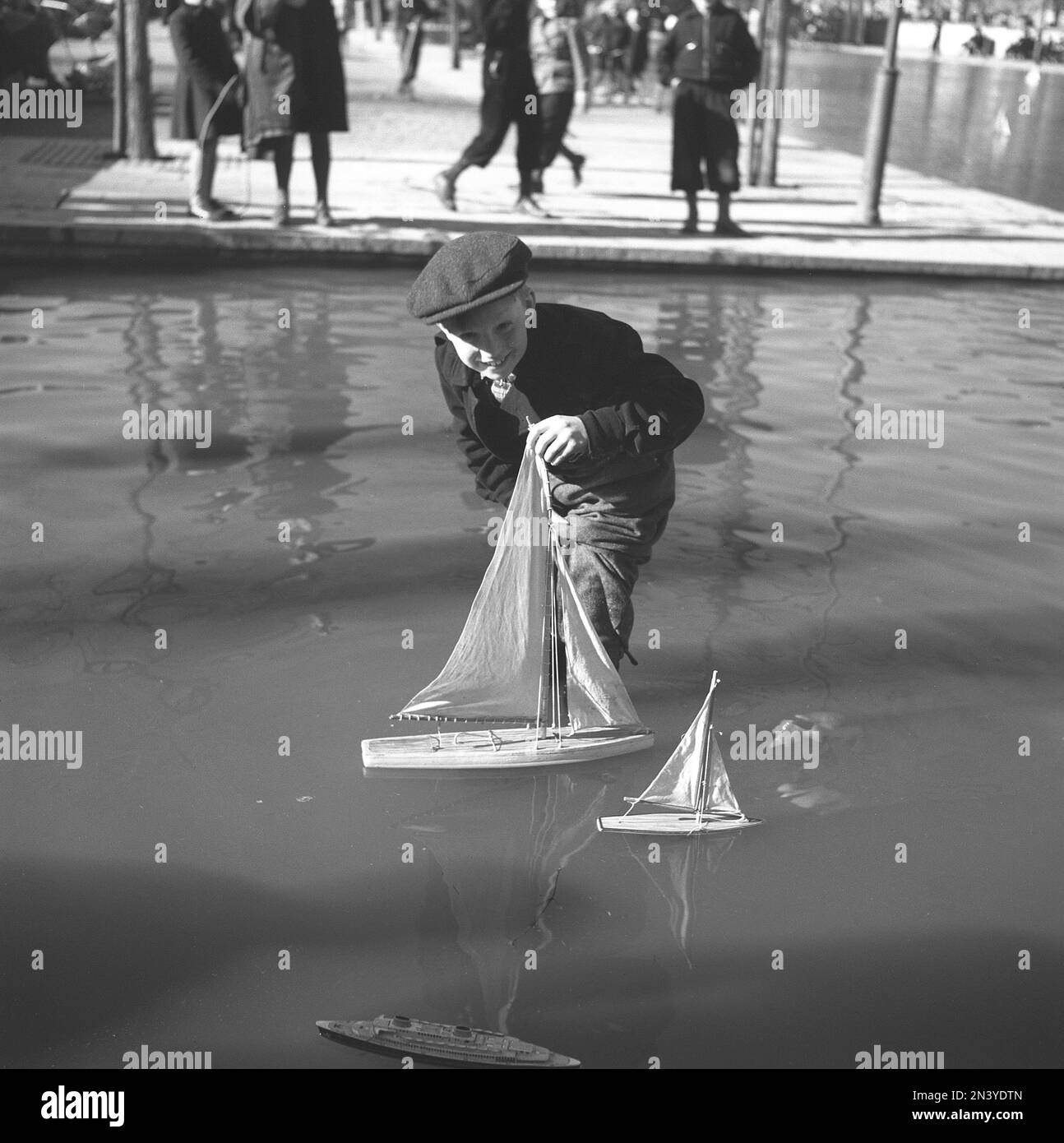 In the 1940s. Children with their model sailboats pictured on this ...