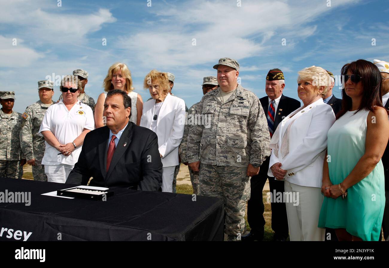 New Jersey Adjutant General Brig. Gen. Michael Cunniff, center, stands ...