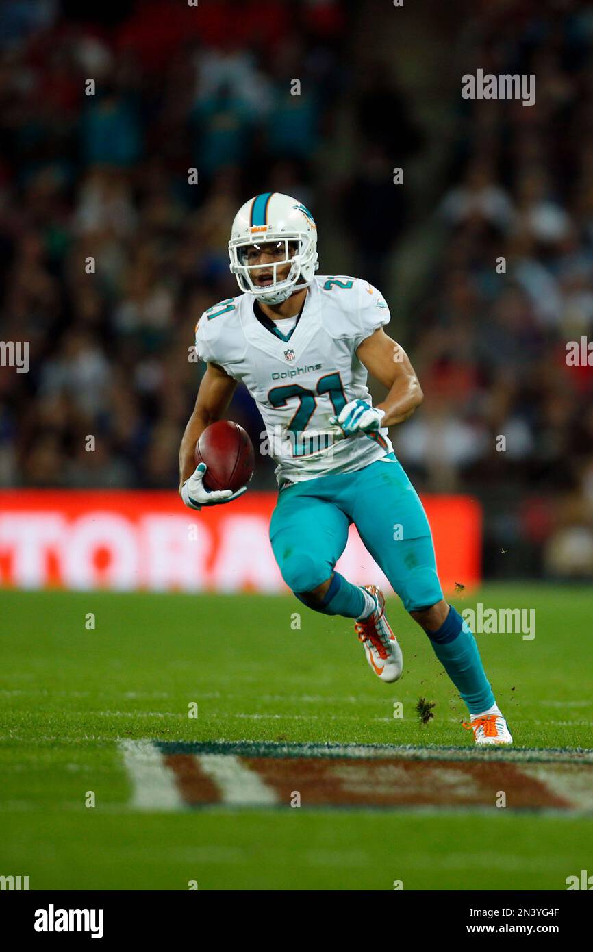 Miami Dolphins' Brent Grimes runs with the ball during the second half ...