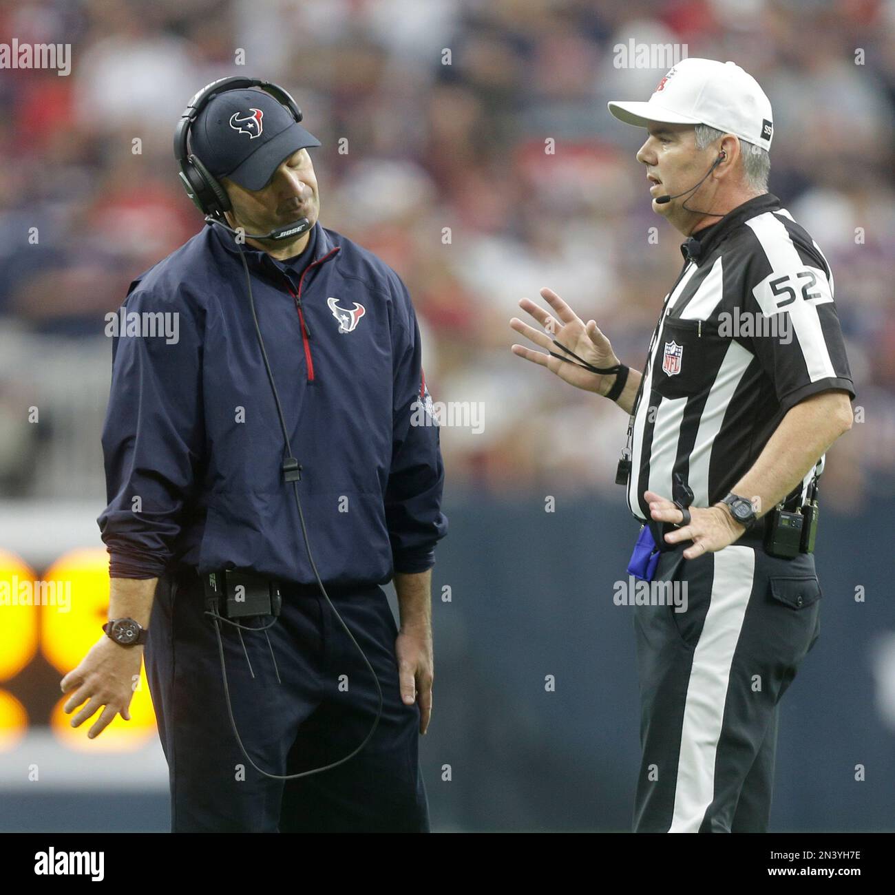 Houston Texans head coach Bill O'Brien has a discussion with referee ...