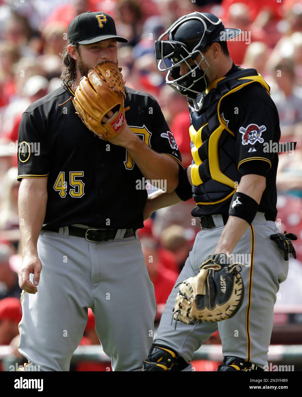Pittsburgh Pirates starting pitcher Gerrit Cole (45) talks with catcher ...