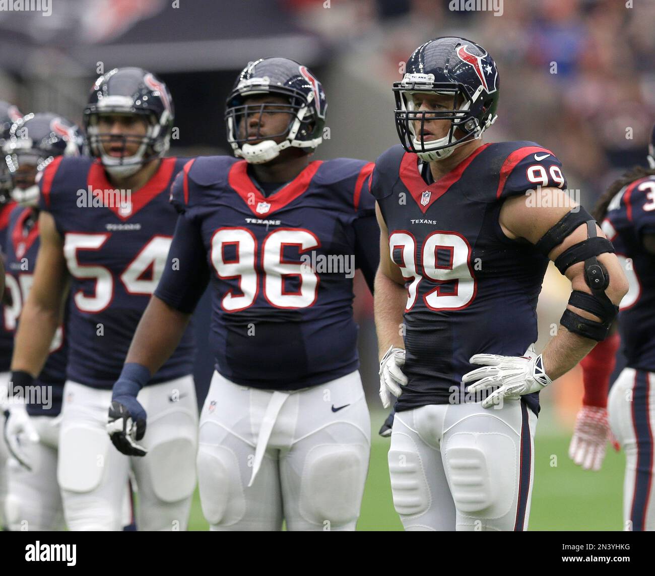 Houston Texans defensive end J.J. Watt (99) lines up with teammates ...