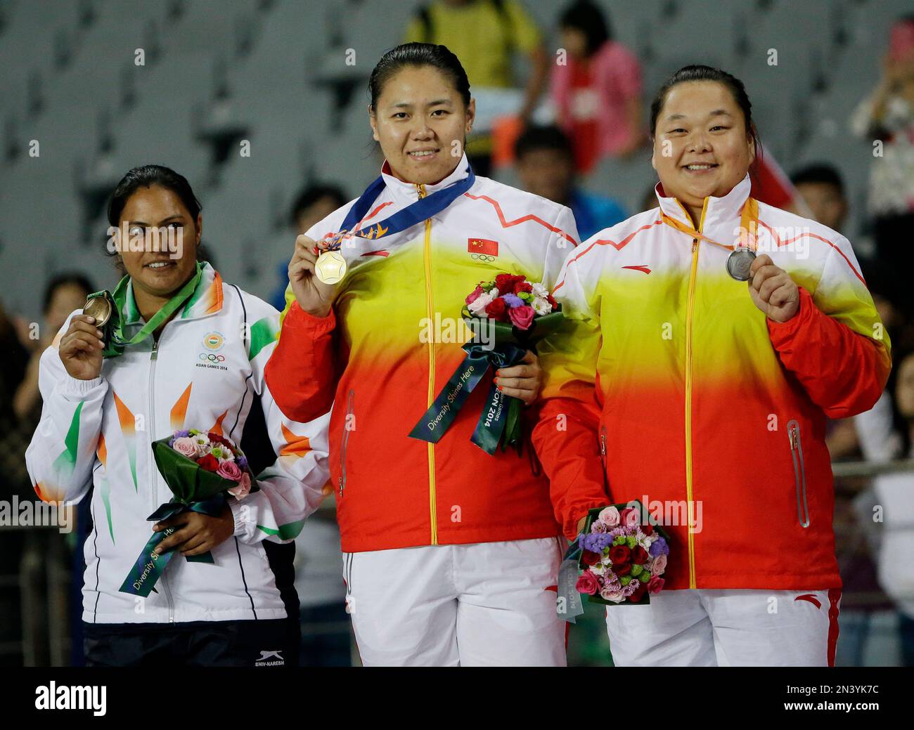 From left, bronze medalist India’s Bala Manju, gold medalist Zhang ...