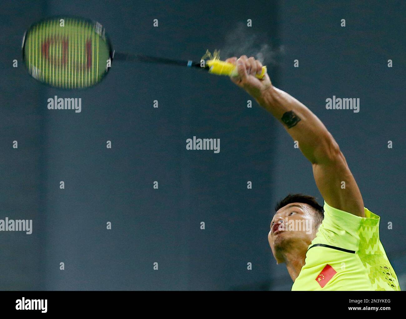 China's Lin Dan returns a shot to Malaysia's Lee Chong Wei during the ...