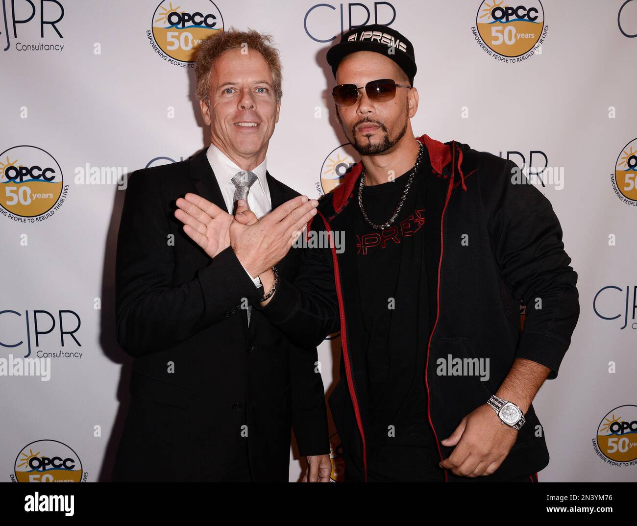 EXCLUSIVE - Actor Greg Germann, left, and rapper Supreme attend the ...