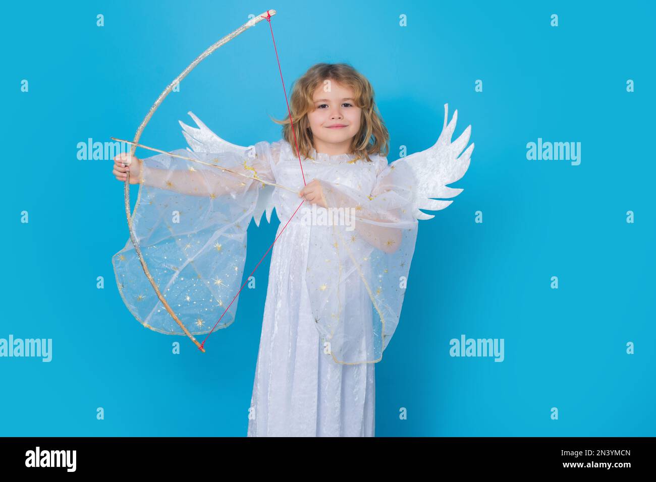 Angel kid shoots a love arrow from a bow on Valentines Day. Beautiful ...