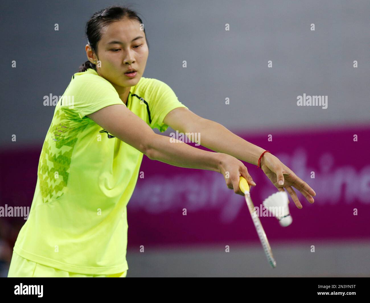 China's Wang Yihan serves to China's Li Xuerui during the women's ...