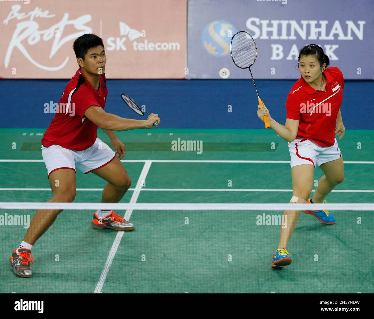 Indonesia's Praveen Jordan, left, and Debby Susanto return a shot to ...