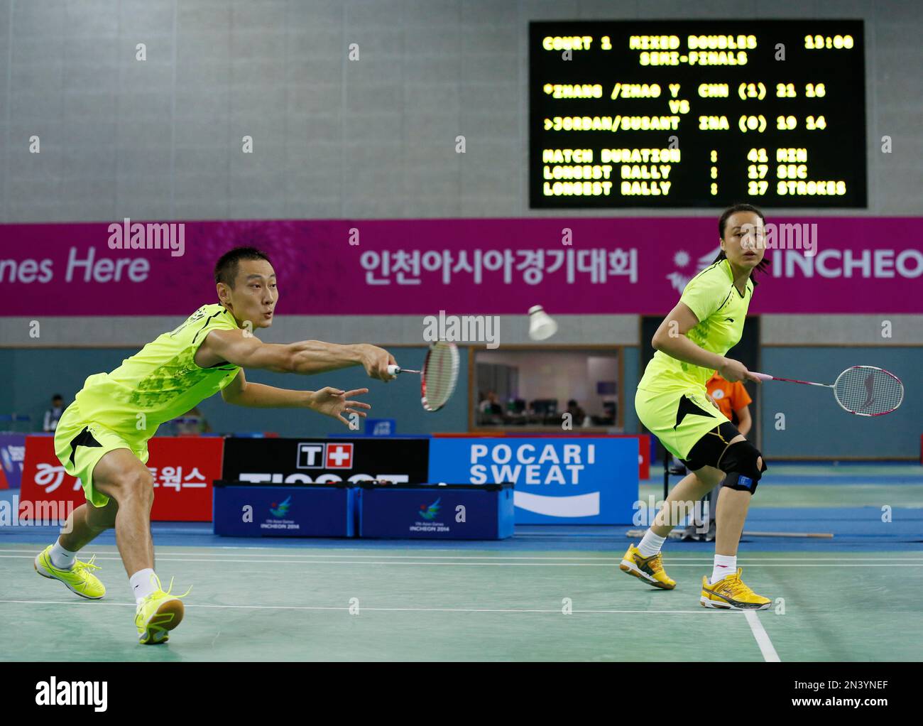 China's Zhang Nan, left, and Zhao Yunlei return a shot to Indonesia's ...