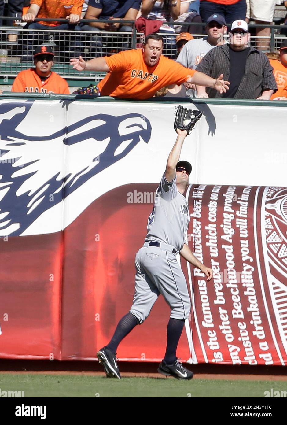 San Diego Padres left fielder Seth Smith catches a fly ball hit by the ...