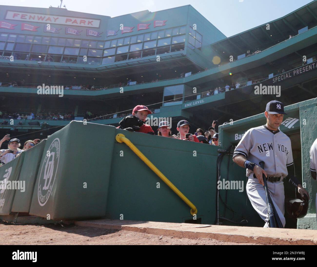 New York Yankees designated hitter Derek Jeter walks to the dugout ...