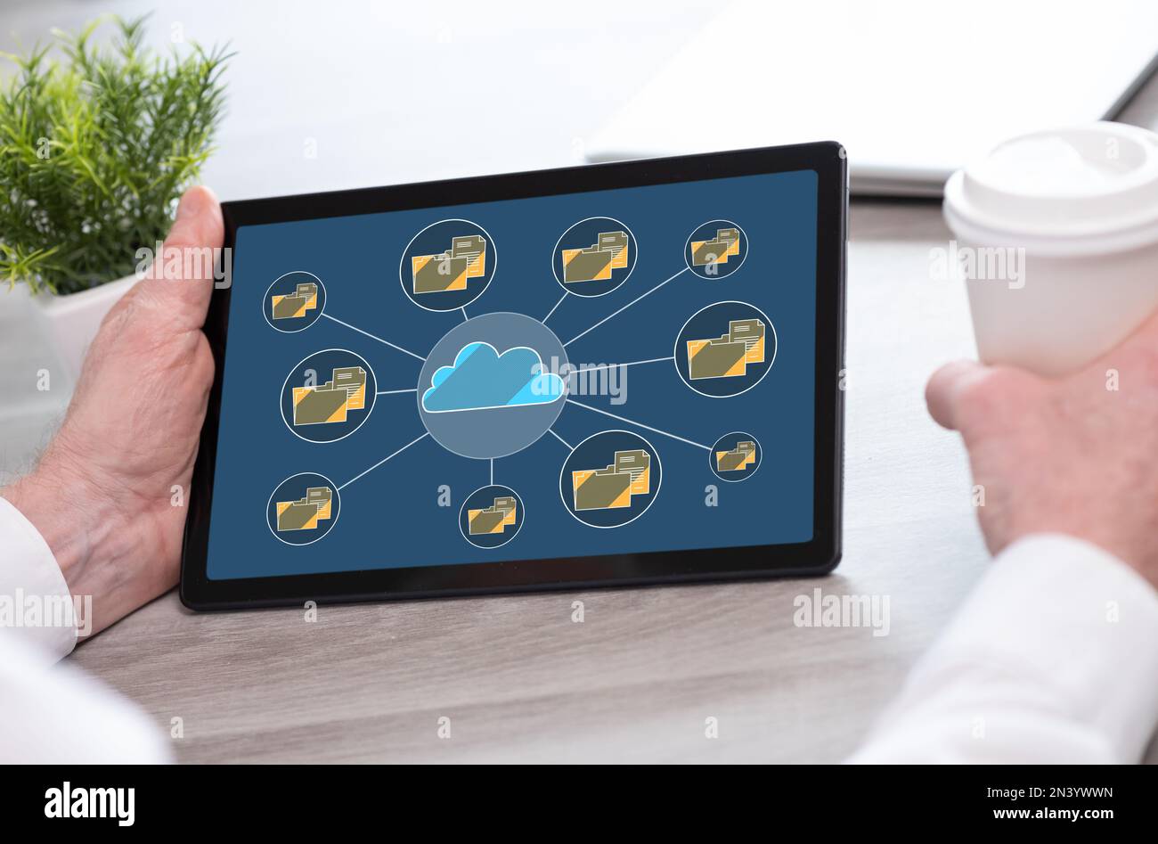 Tablet screen displaying a cloud storage concept Stock Photo - Alamy