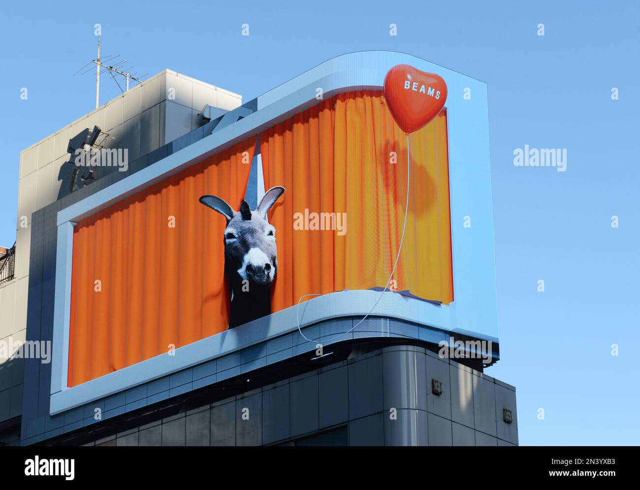 3D donkey in a commercial add displayed on a 3D digital screen in ...