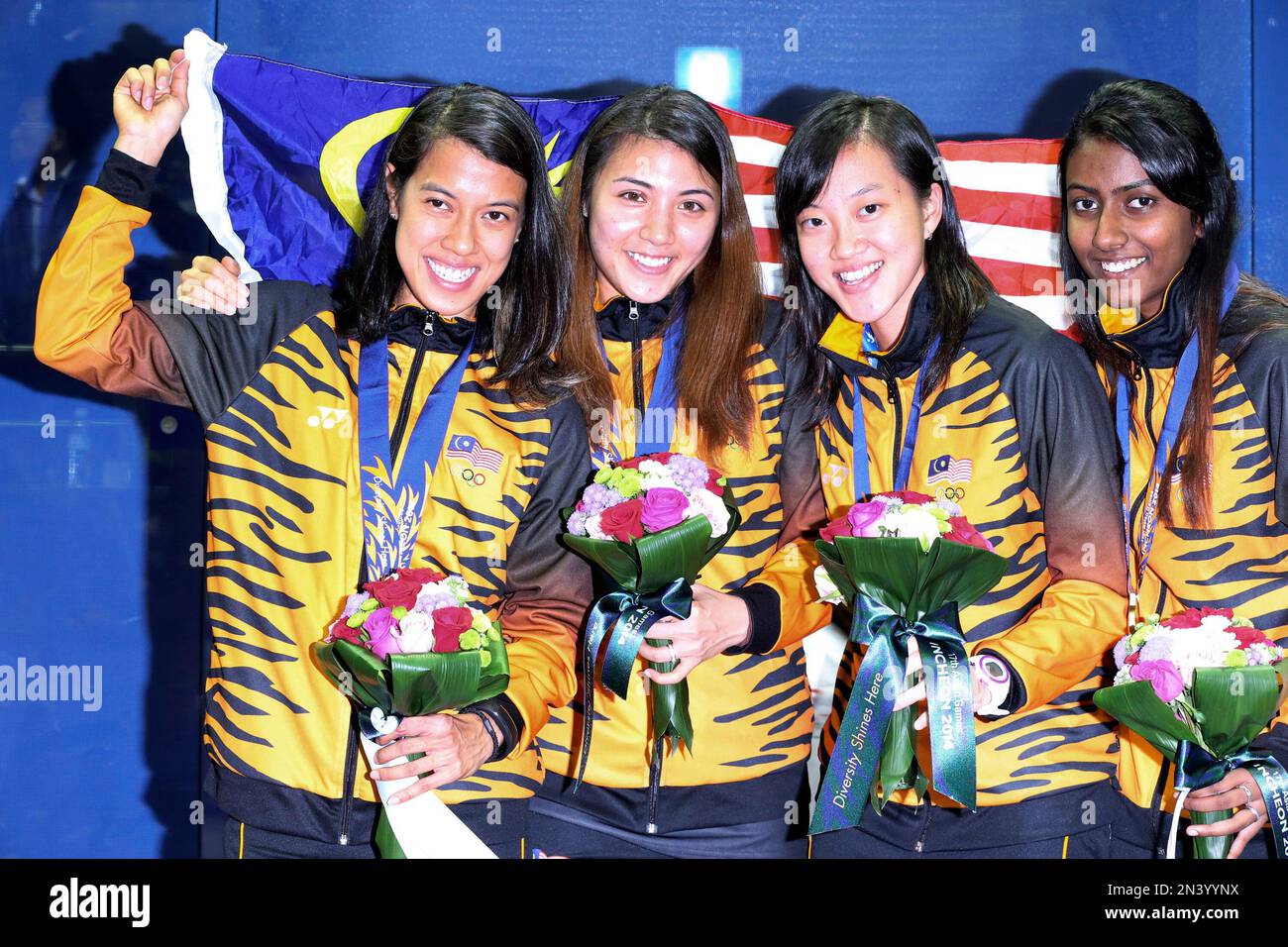 Malaysia’s Nicol David, left, Delia Arnold, 2nd left, Low Wee Wern, 2nd ...