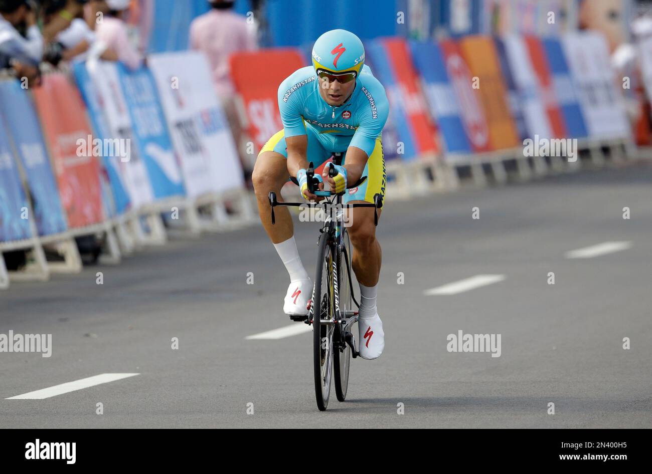 Gold medalist Kazakhstan's Alexey Lutsenko crossed the finish line in ...