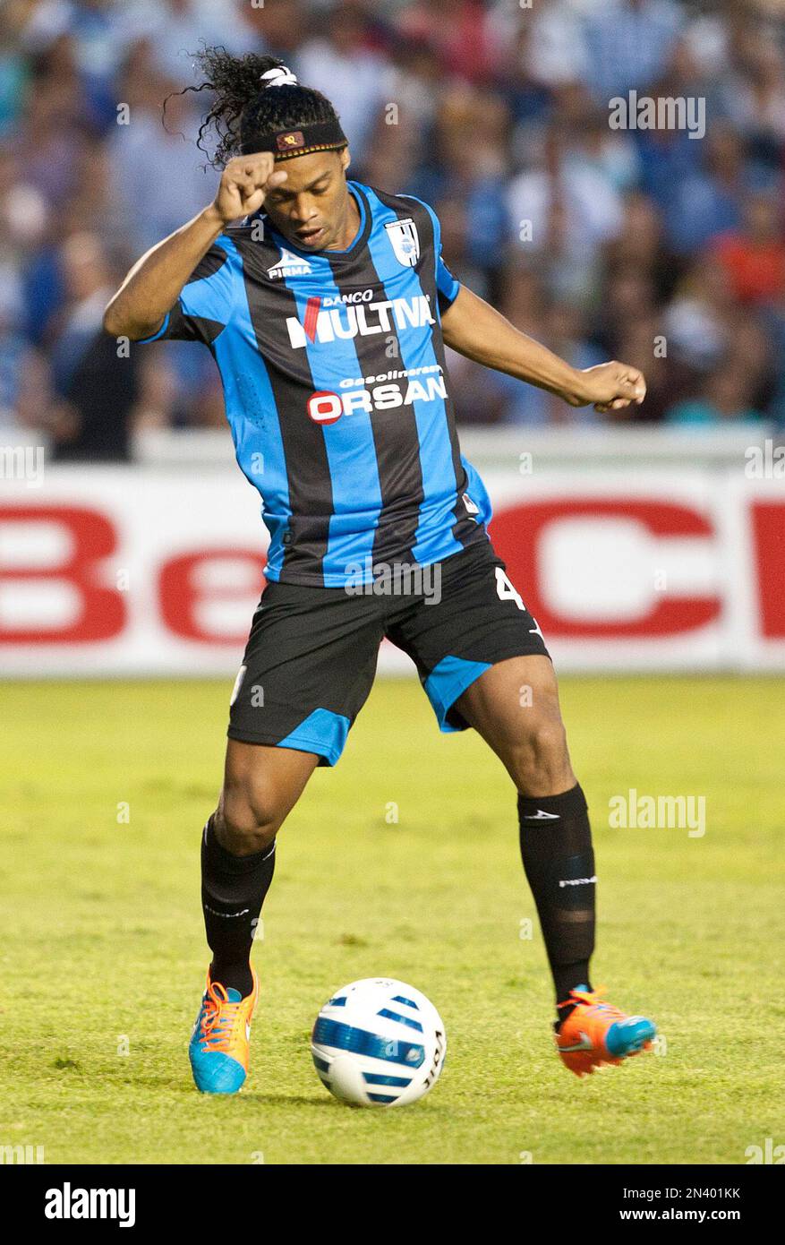 Queretaro's Ronaldino, from Brazil, controls the ball at a Mexican ...