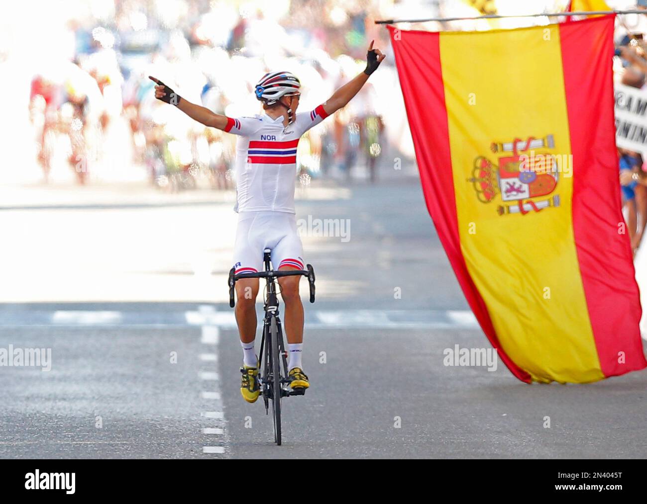 Norway's Sven Erik Bystrom looks over his shoulder to see the gap with ...