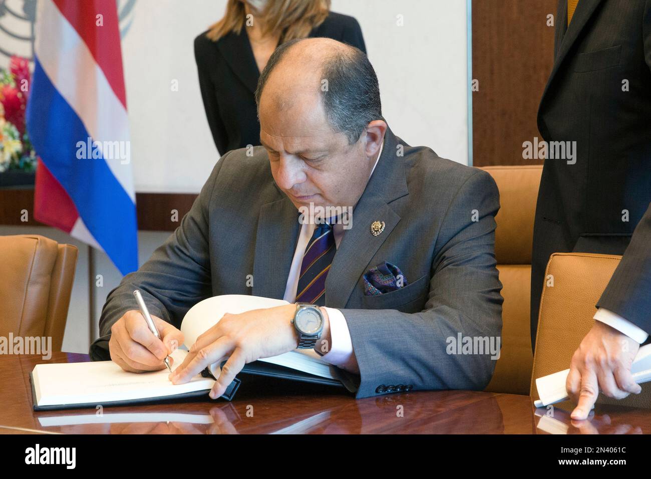 Luis Guillermo Solis Rivera, President of Costa Rica, signs the guest ...