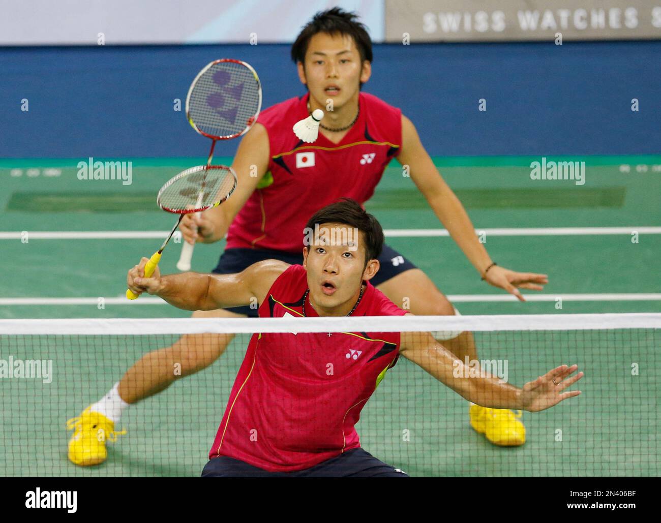 Japan's Keigo Sonoda, front, and Takeshi Kamura return a ball to South ...