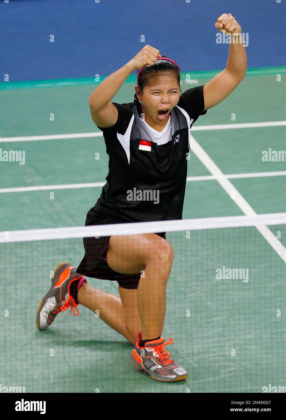 Indonesia's Greysia Polii celebrates after winning the women's doubles ...