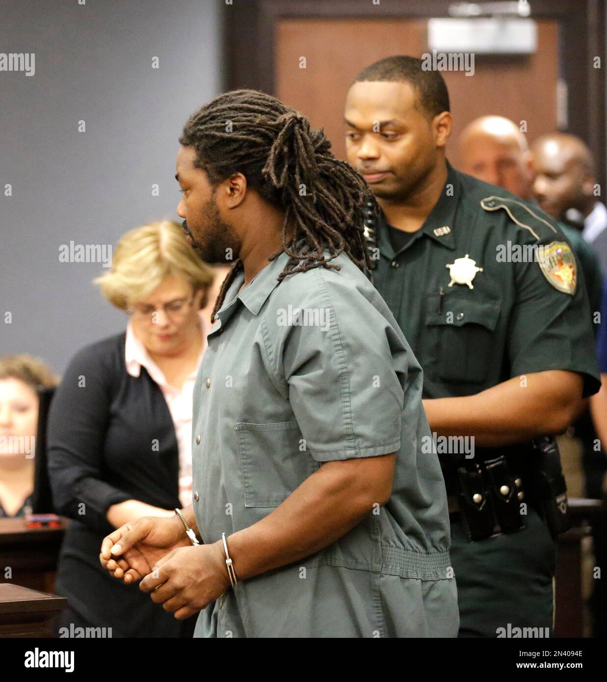 Jesse Leroy Matthew Jr. is escorted into a courtroom for an appearance before 405th District ...