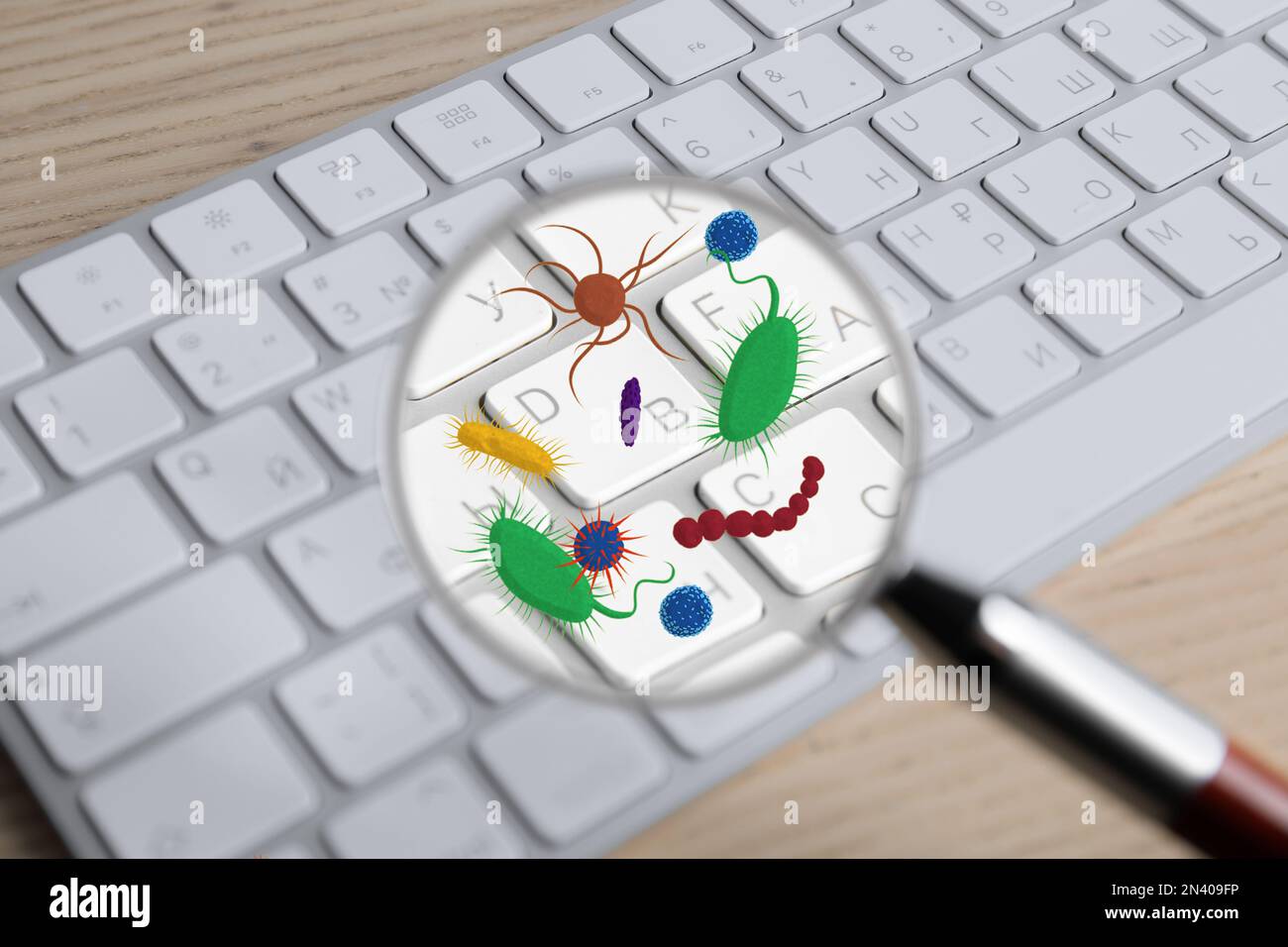 Magnifying glass detecting microbes on keyboard, closeup Stock Photo ...