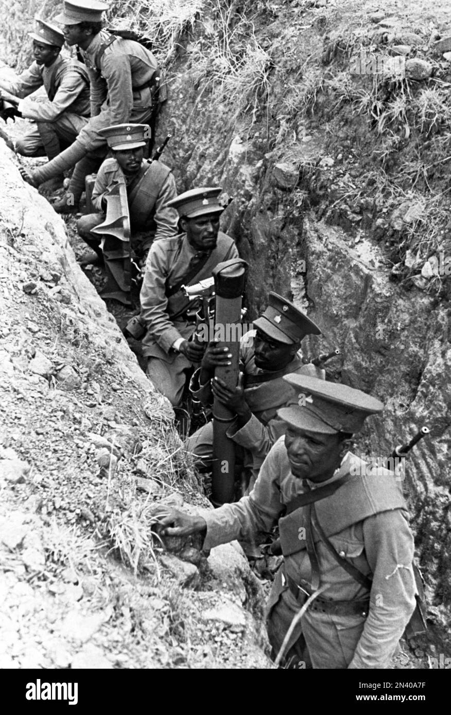 Ethiopian troops lining a trench during manoeuvres near Addis Ababa ...