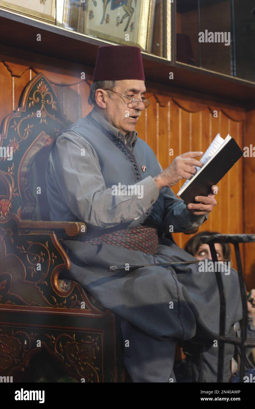 Abu Shady, a traditional storyteller or hakawati, Al Nawfara Coffee ...