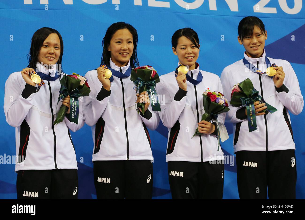 Japan's women's 4 x 100-meter medley relay final team from left, Shiho ...