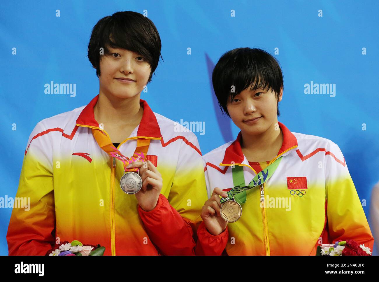 China's silver medalist Suo Ran, left, and her compatriot and bronze ...