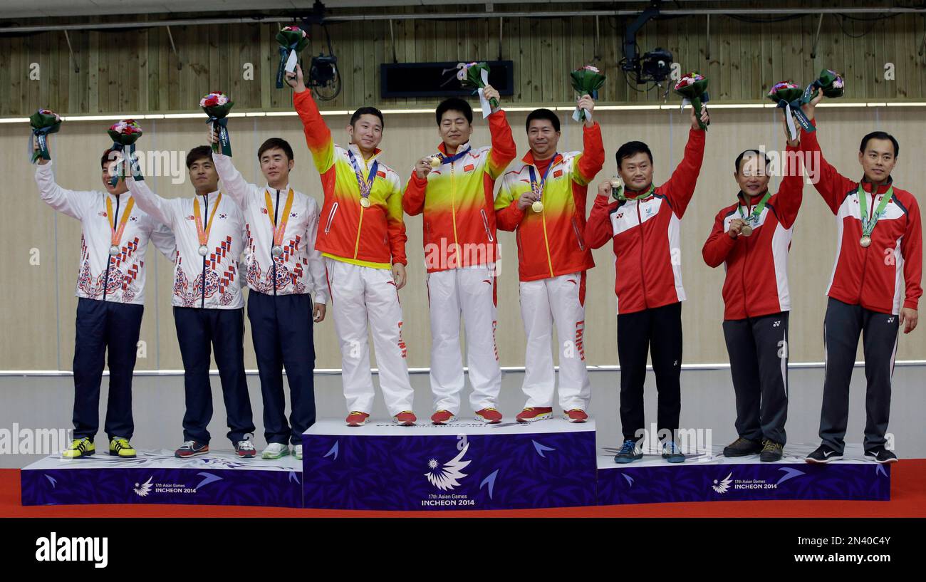 Gold medal winners China's Ding Feng, Jin Yongde, Lin Chuanlin, from ...