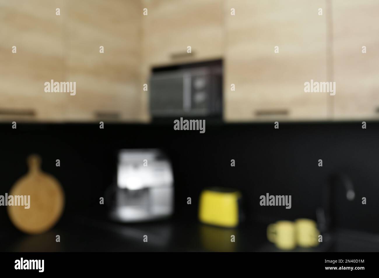 Blurred view of kitchen interior with modern furniture Stock Photo - Alamy