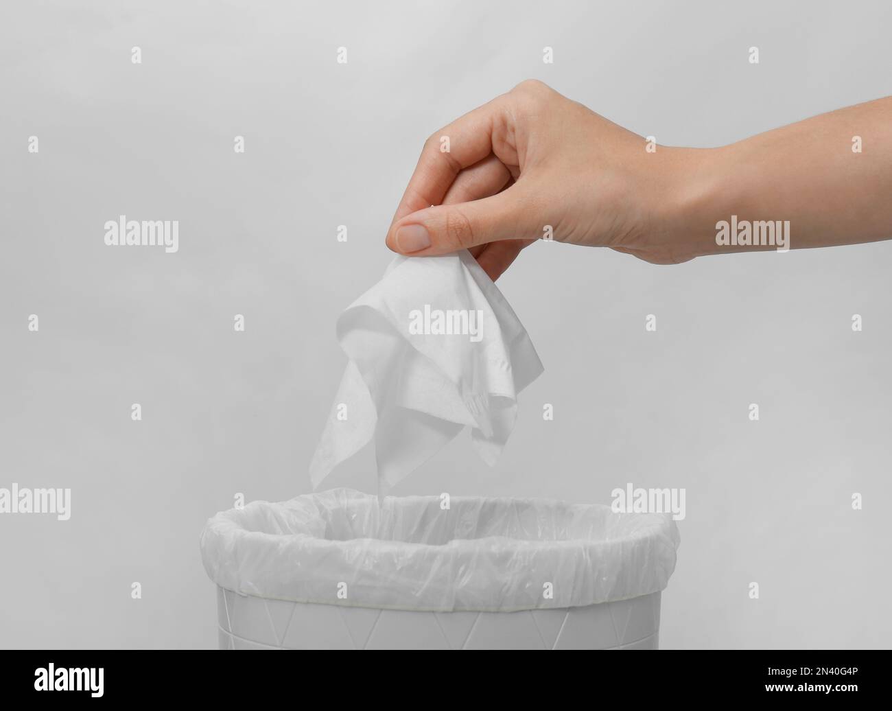 Woman putting paper tissue hi-res stock photography and images - Alamy