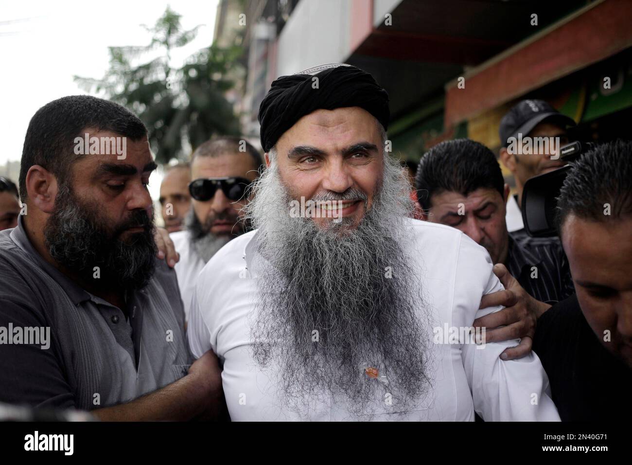 Family and friends of radical al-Qaida-linked preacher Abu Qatada ...