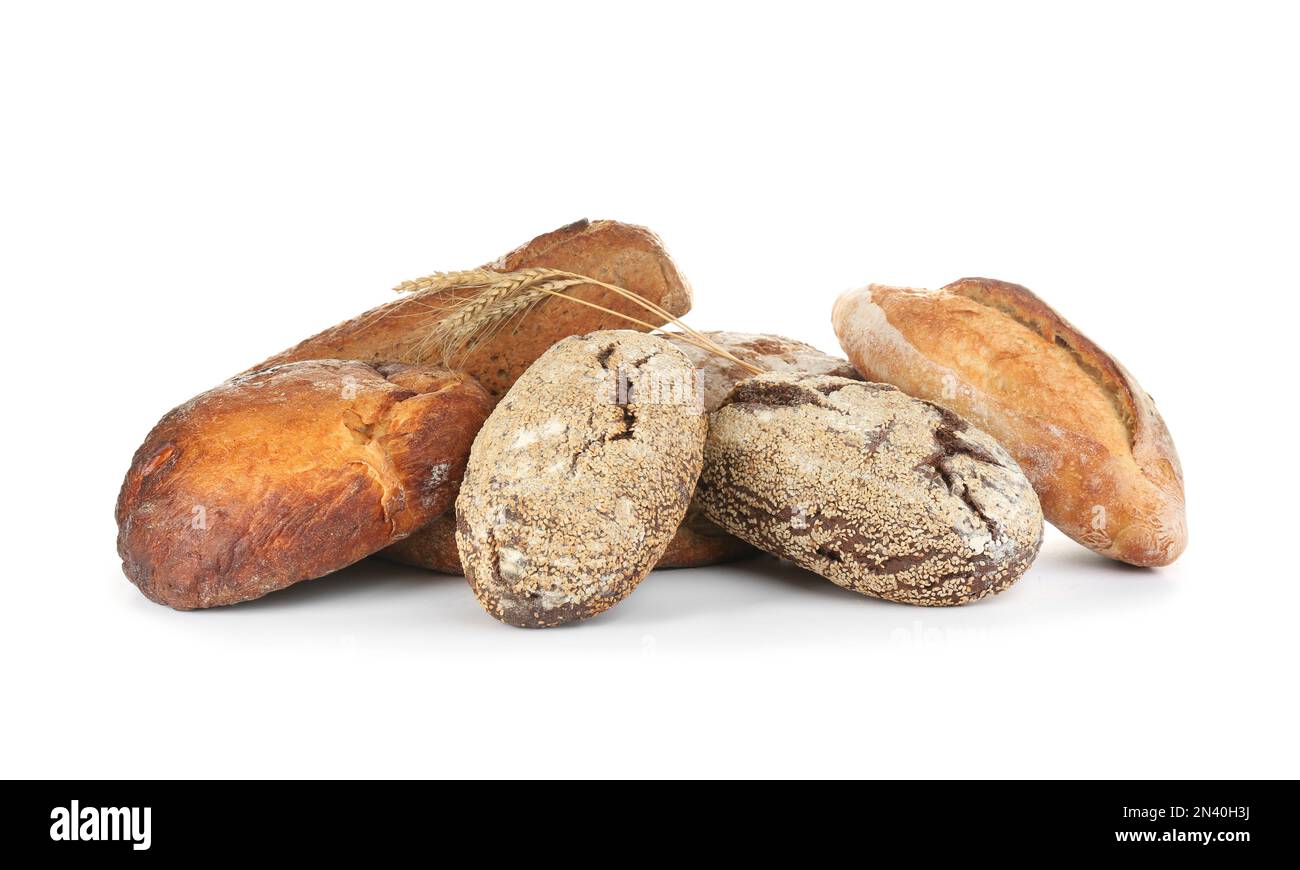Loaves of delicious fresh bread on white background Stock Photo - Alamy