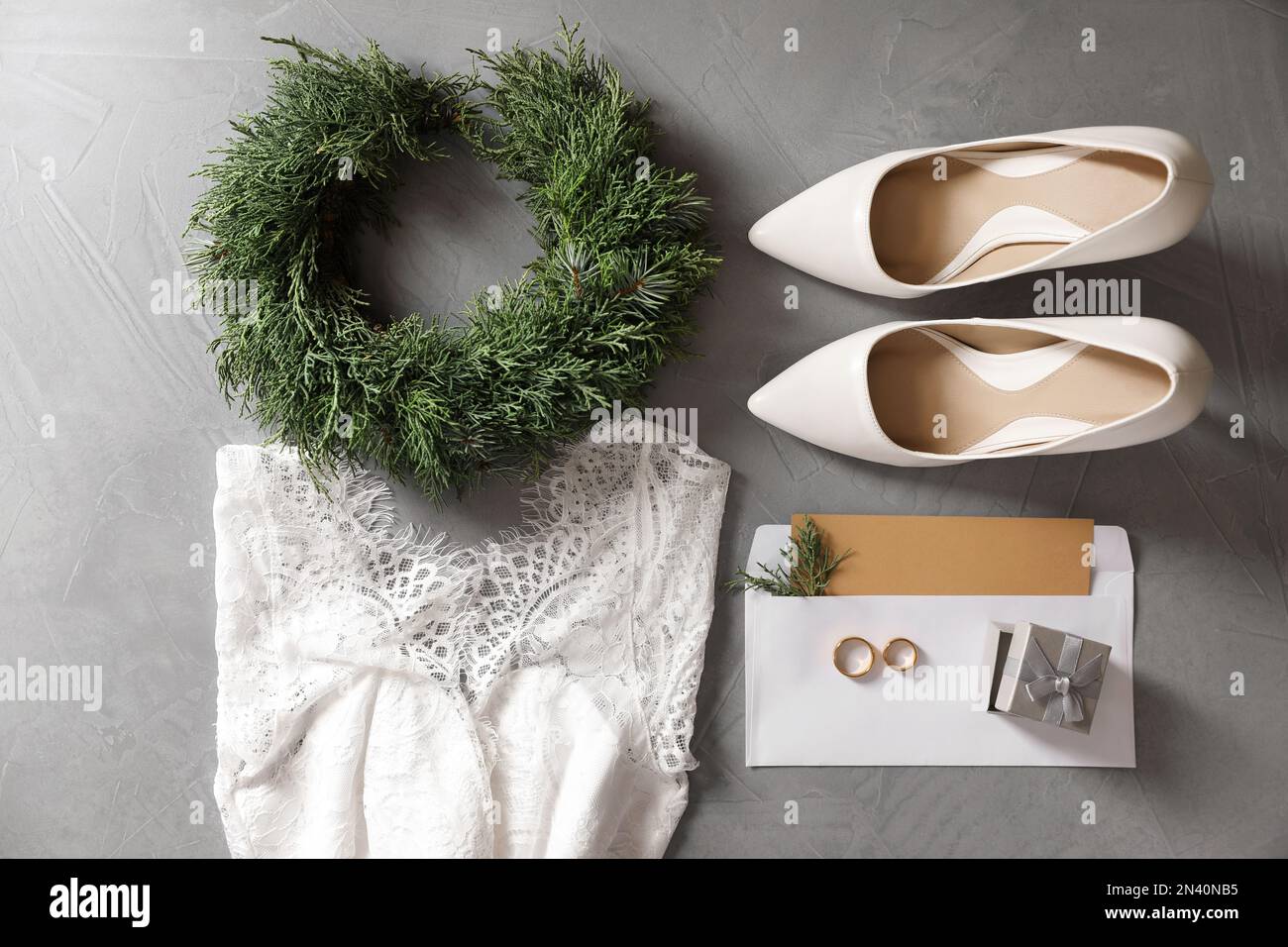 Flat lay composition with wedding dress, white high heel shoes and ...