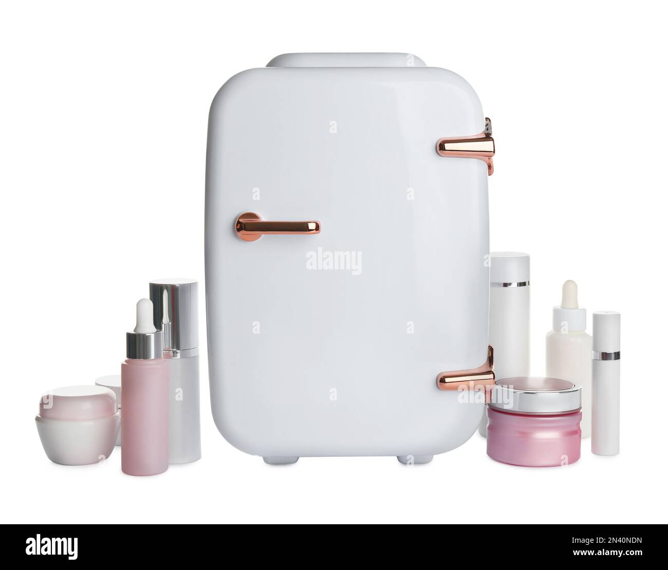 Cosmetics refrigerator and skin care products on white background Stock ...