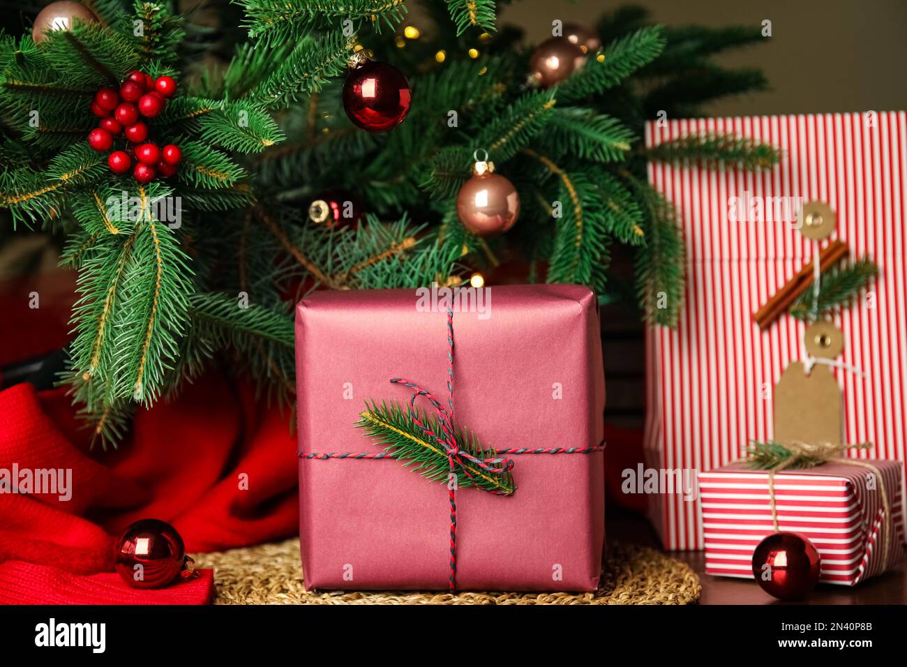 Composition with beautifully wrapped gift boxes on table Stock Photo ...